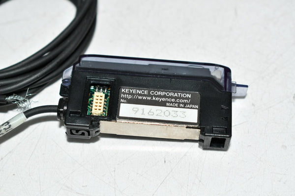 NEW Keyence FS-M2P MANUAL CALIBRATION AMPLIFIER PNP 12-24VDC RED LED